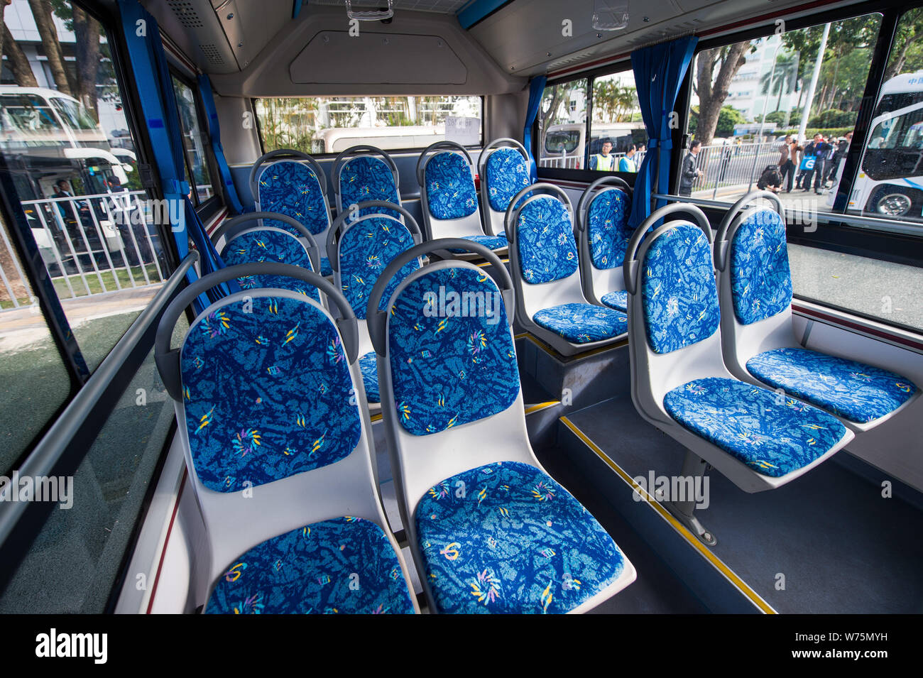 Interior view of a self-driving bus on a street during trial operations ...