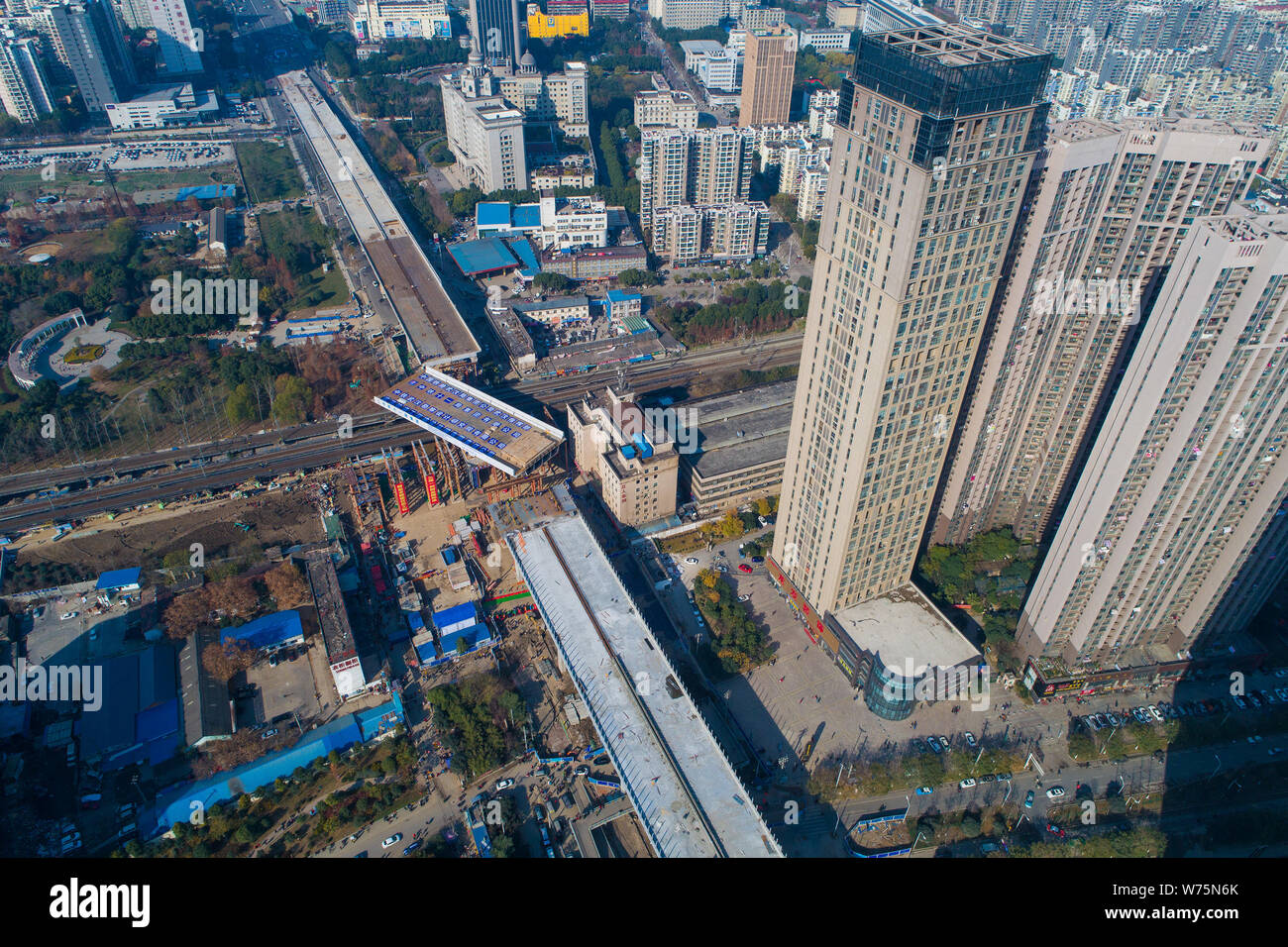 A box girder bridge rotates clockwise over a railway to dock with the ...