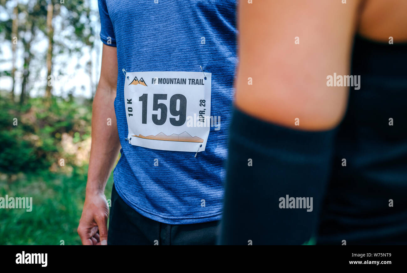 Race number bibs hi-res stock photography and images - Alamy