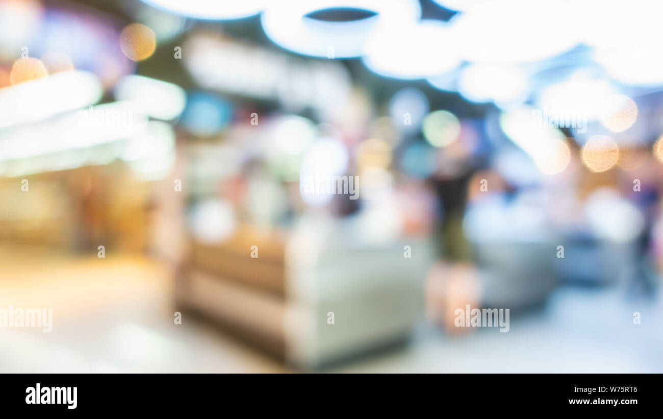 Blurred background of customer shopping at supermarket store blur ...