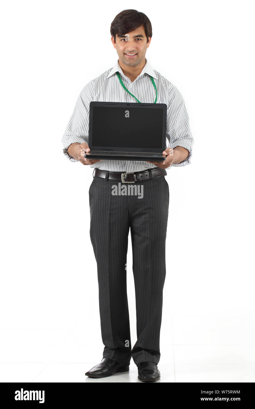 Salesman showing a laptop Stock Photo - Alamy
