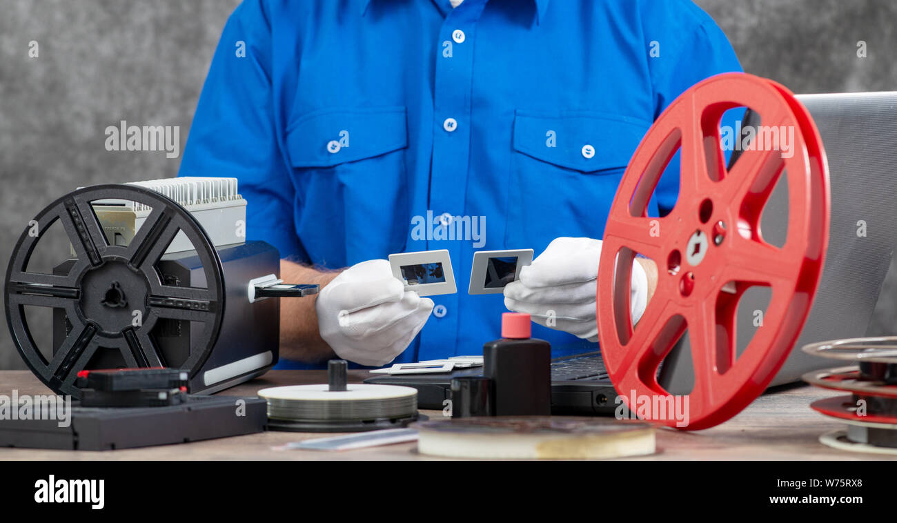 hand photographer digitize a film slide 35mm for saving Stock Photo - Alamy