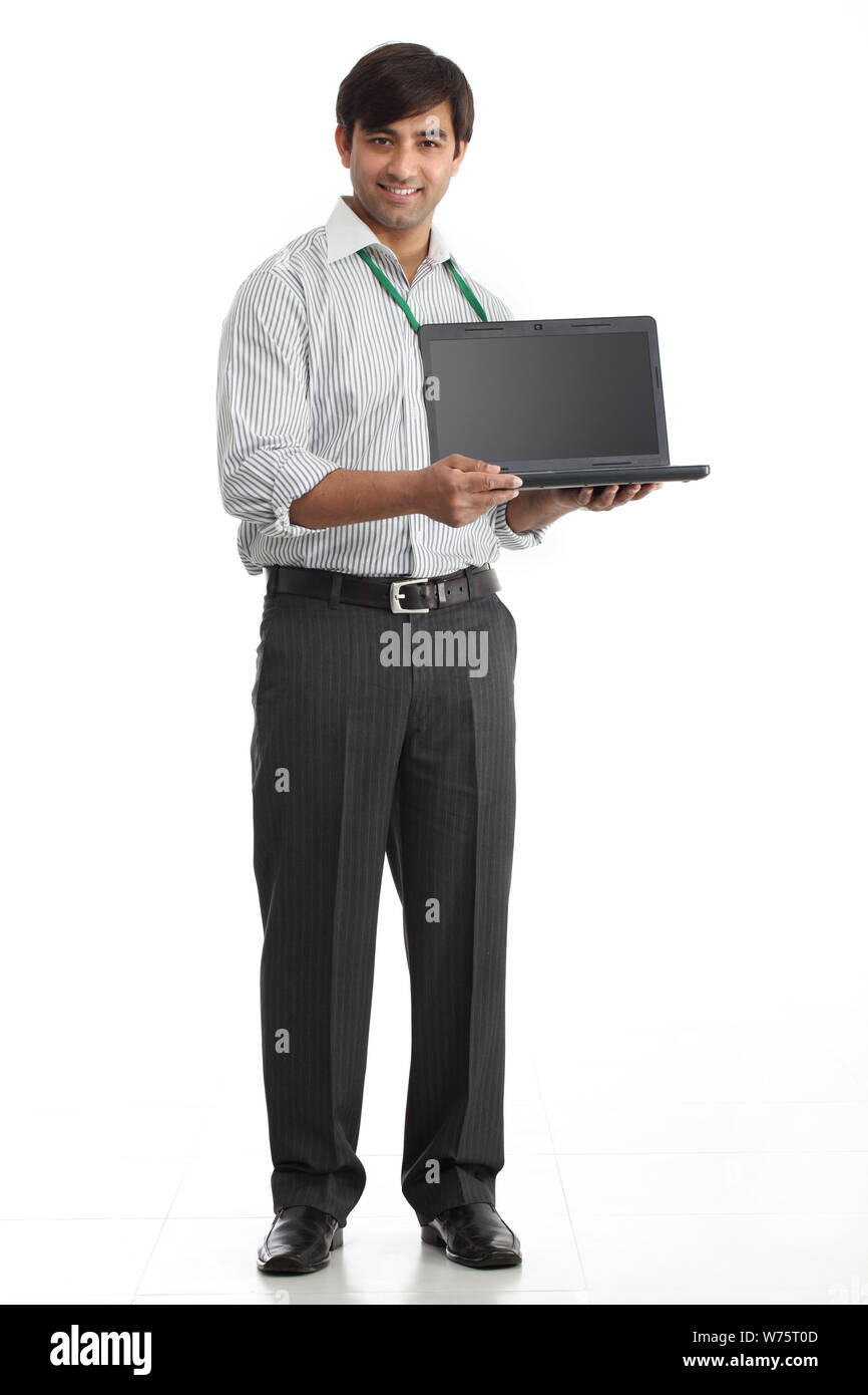 Salesman showing a laptop Stock Photo - Alamy