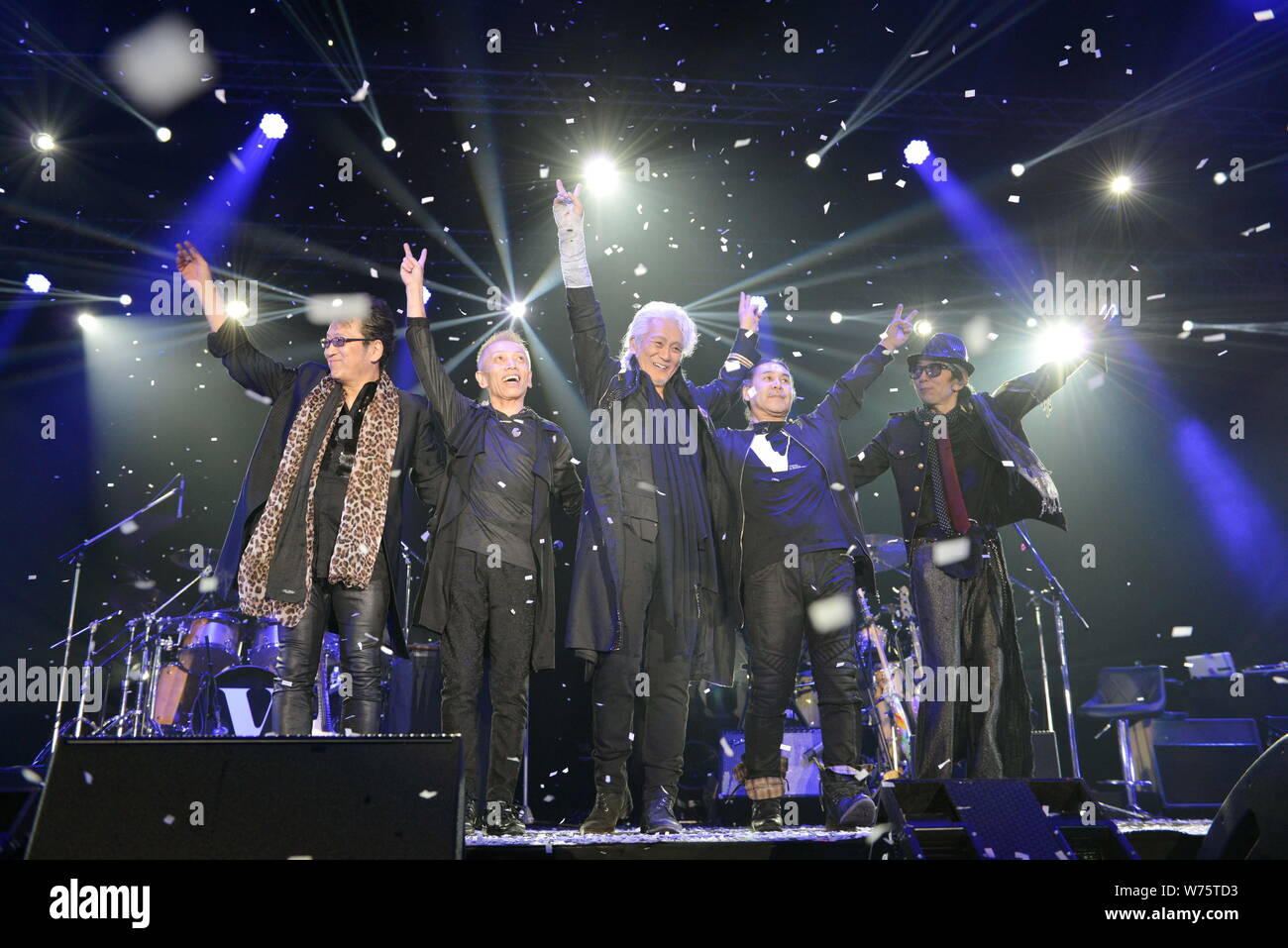 Members of Japanese rock band Anzen Chitai perform at a concert in Hong ...