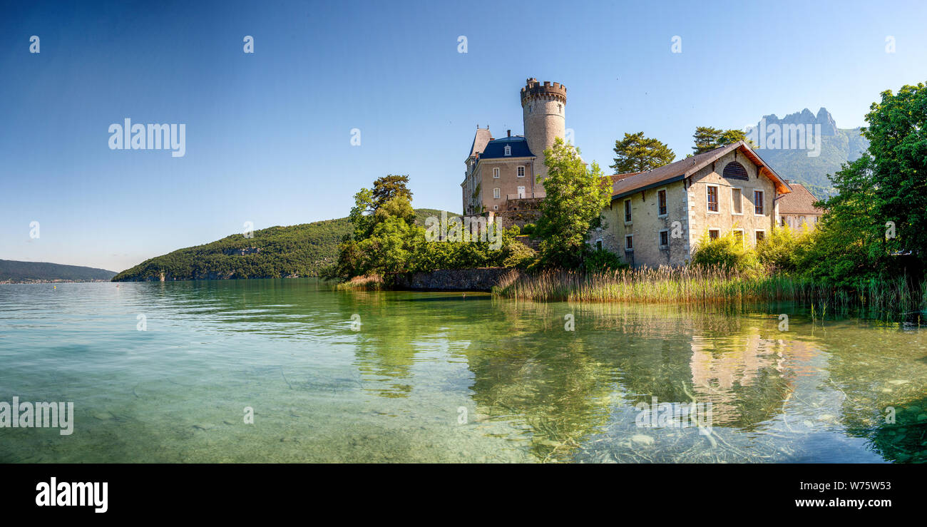 a medieval castle on Annecy lake in Alpes mountains, France Stock Photo ...