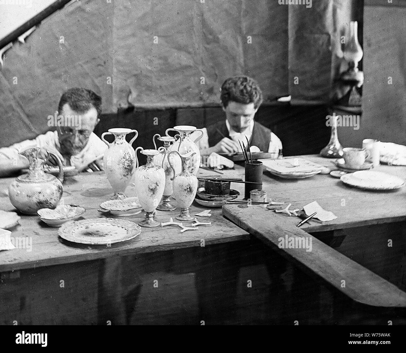Enamel painting in a pottery factory Stock Photo - Alamy