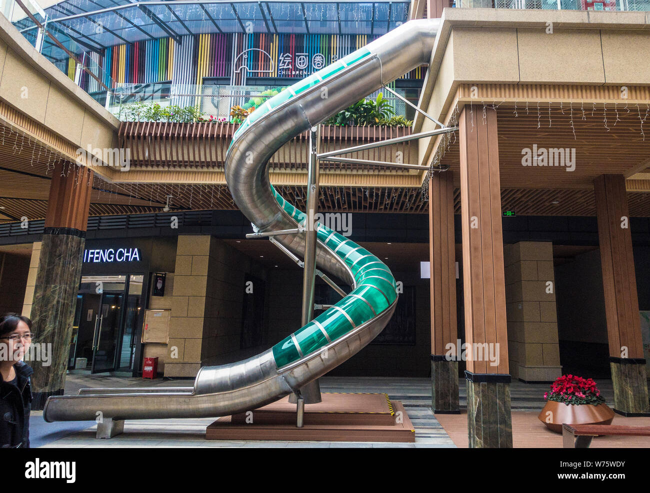 --FILE--View of a slide at a shopping mall in Chengdu city, southwest ...