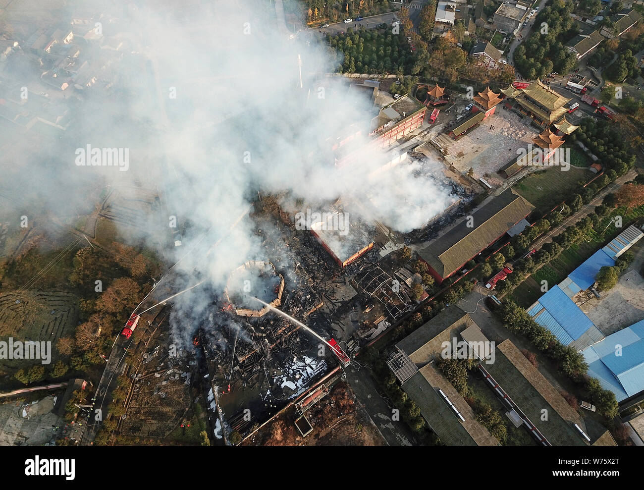 Aerial view of Asia's tallest wood pagoda burnt in fire at Jiulong ...