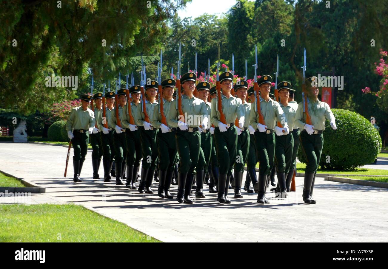 --FILE--Chinese paramilitary policemen patrol the Tian'anmen Square in ...