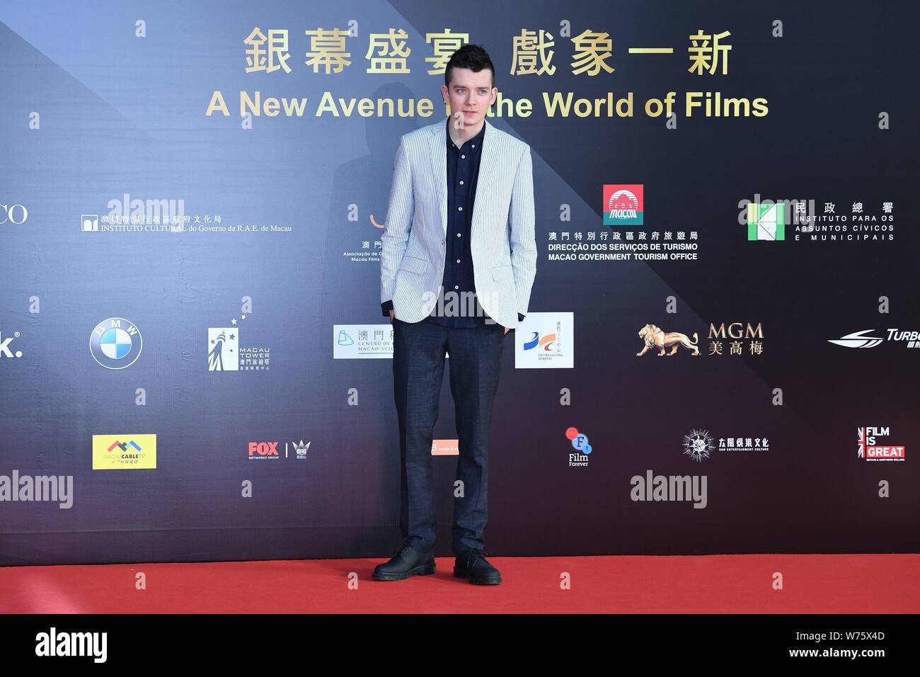 English actor Asa Butterfield poses as he arrives on the red carpet for ...