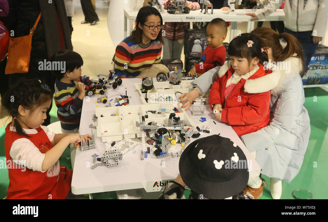 Customers crowd the newly-opened flagship store of British toy retailer ...