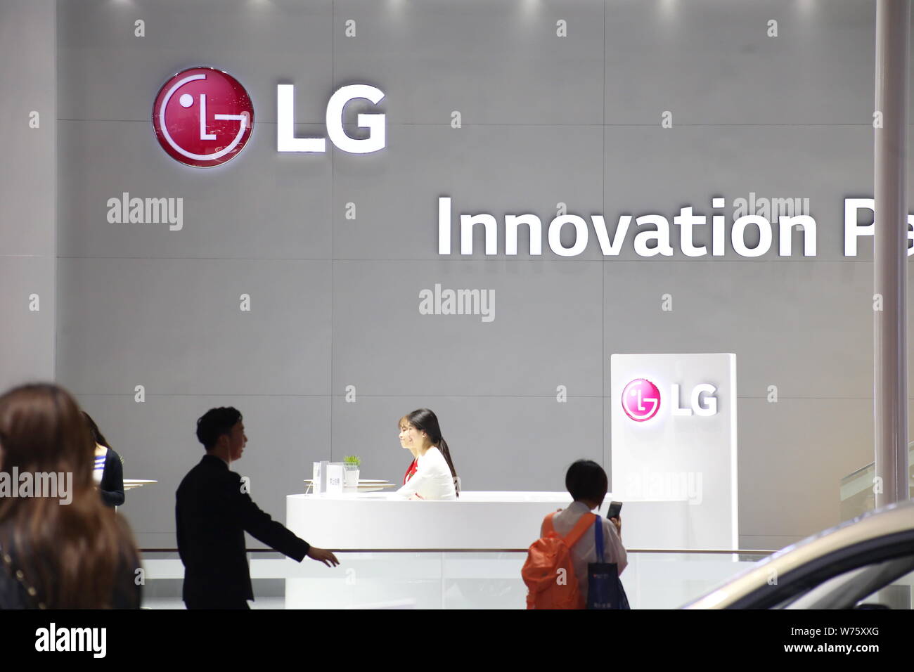 --FILE--People visit the stand of LG during the 17th Shanghai ...