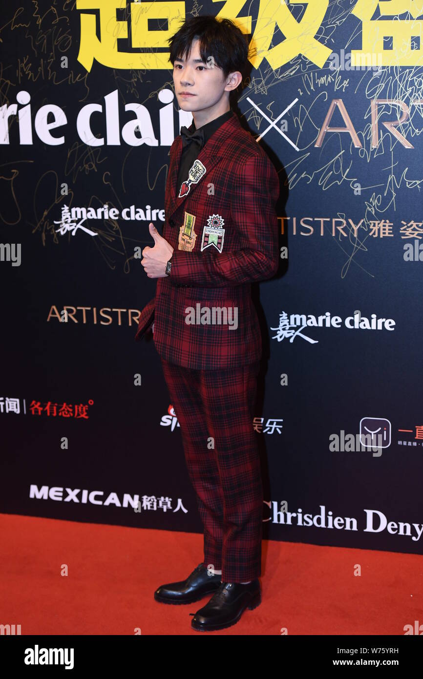 Jackson Yee or Yi Yangqianxi of Chinese boy group TFboys poses as he ...