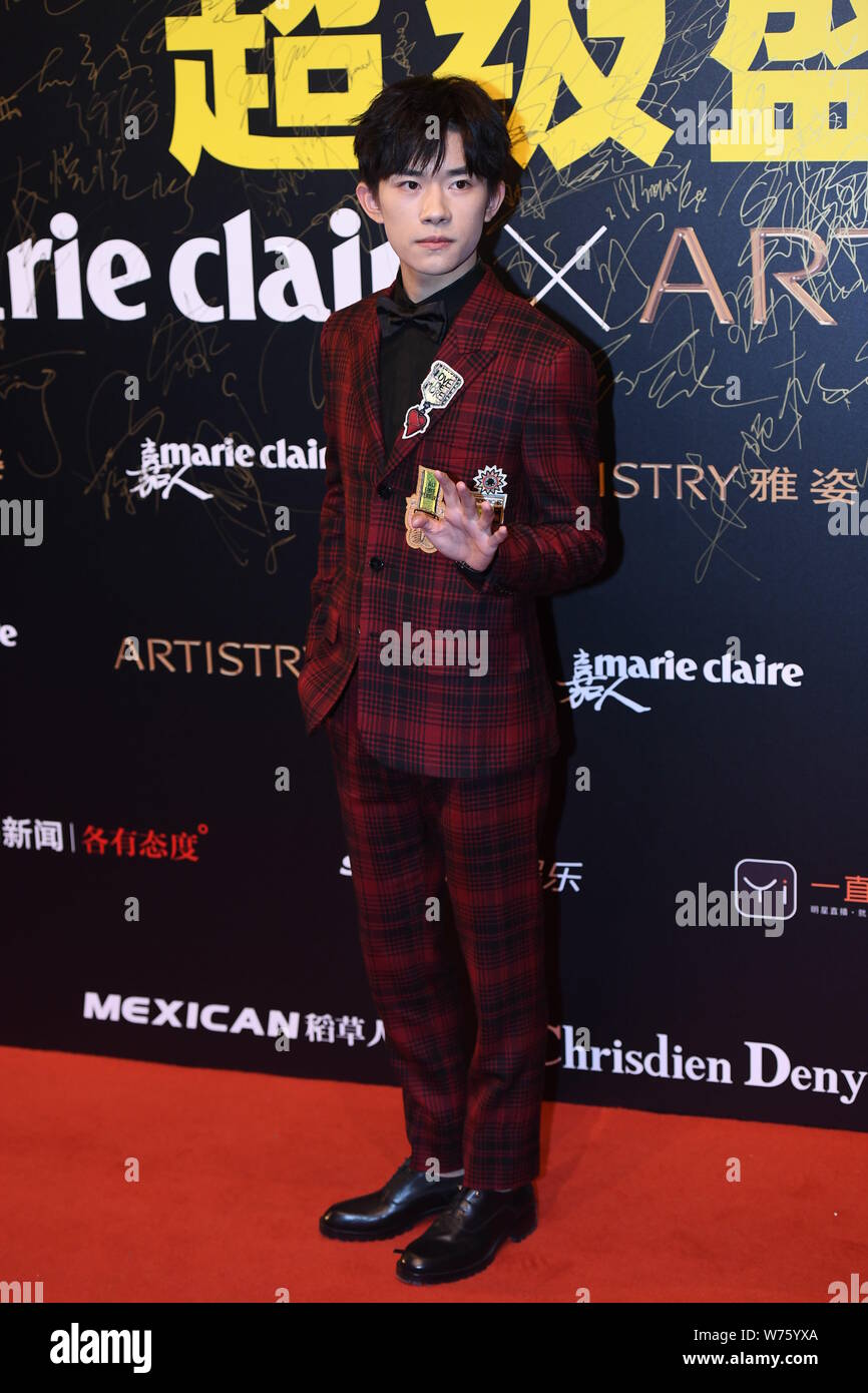 Jackson Yee or Yi Yangqianxi of Chinese boy group TFboys poses as he ...