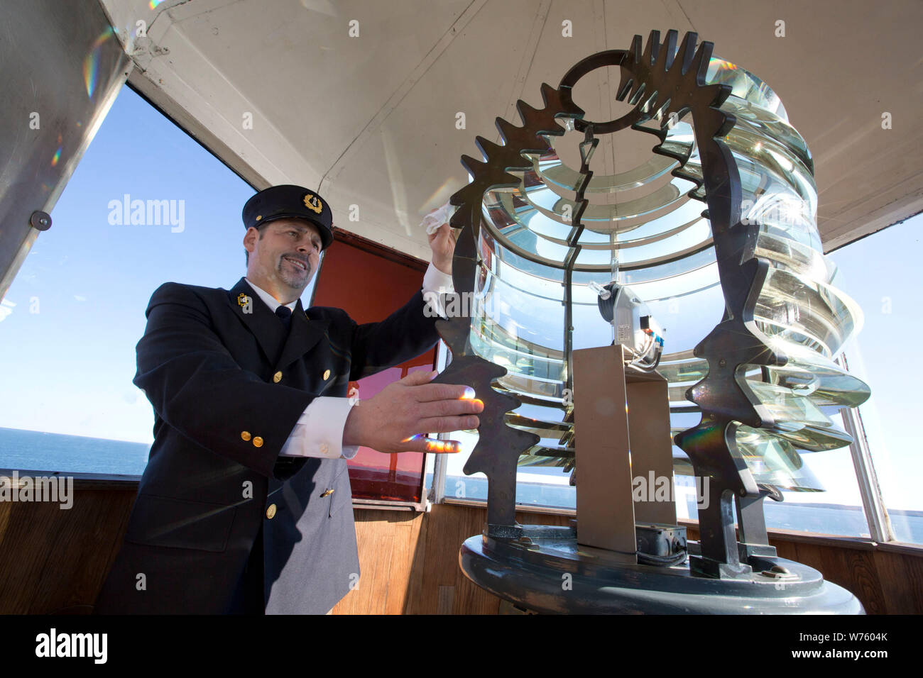 Lighthouse keeper cleaning the lens hi-res stock photography and images ...