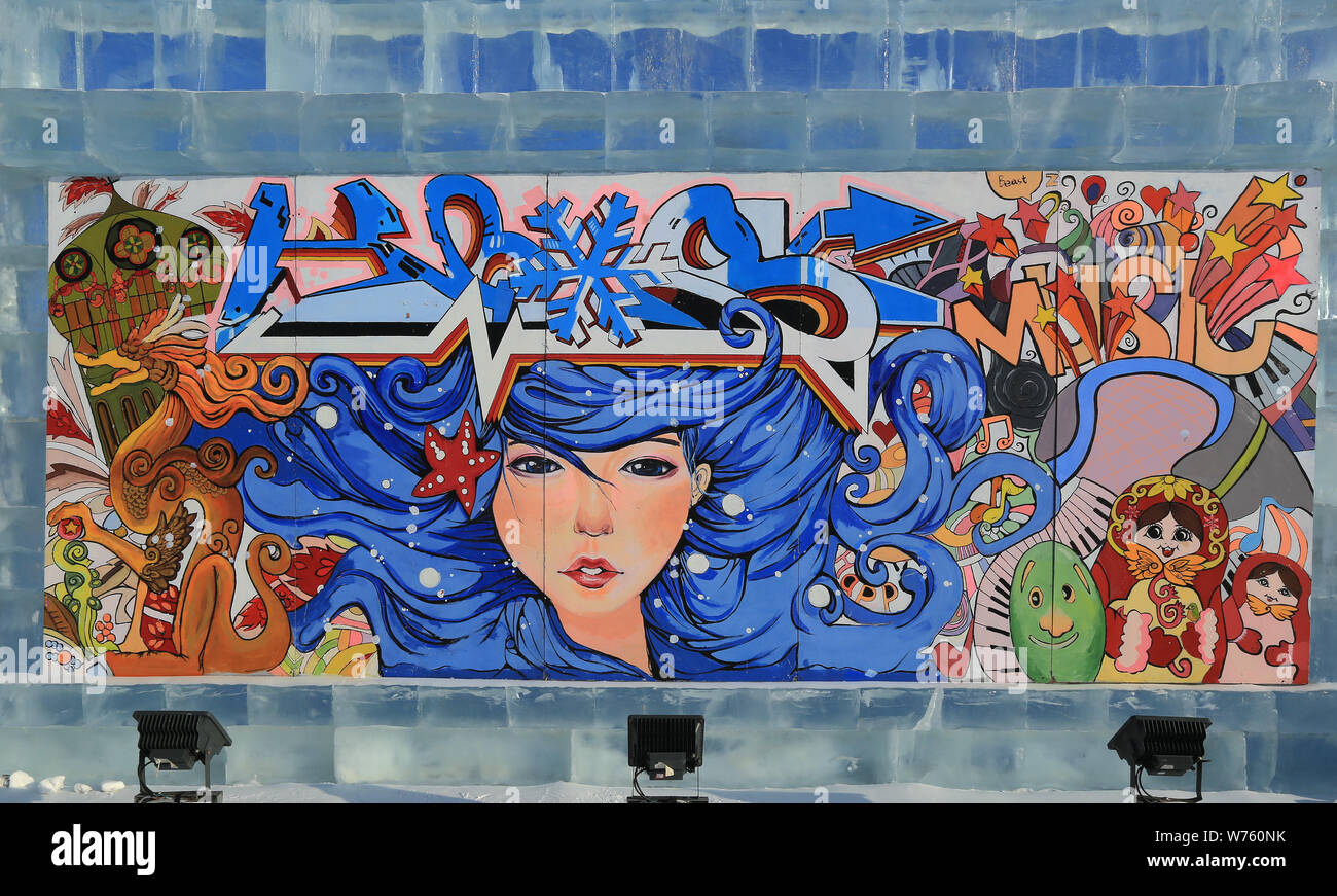 View of graffiti on an ice wall at the Joy City Snow World of Hulan ...