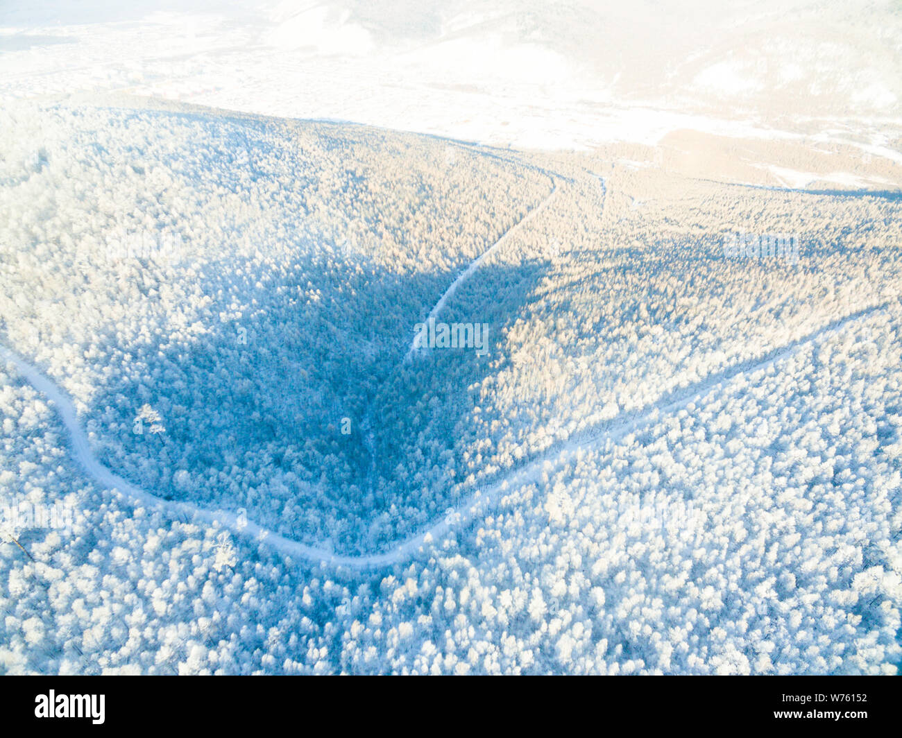 Landscape of a mountain covered with snow in Arxan city, north China's ...