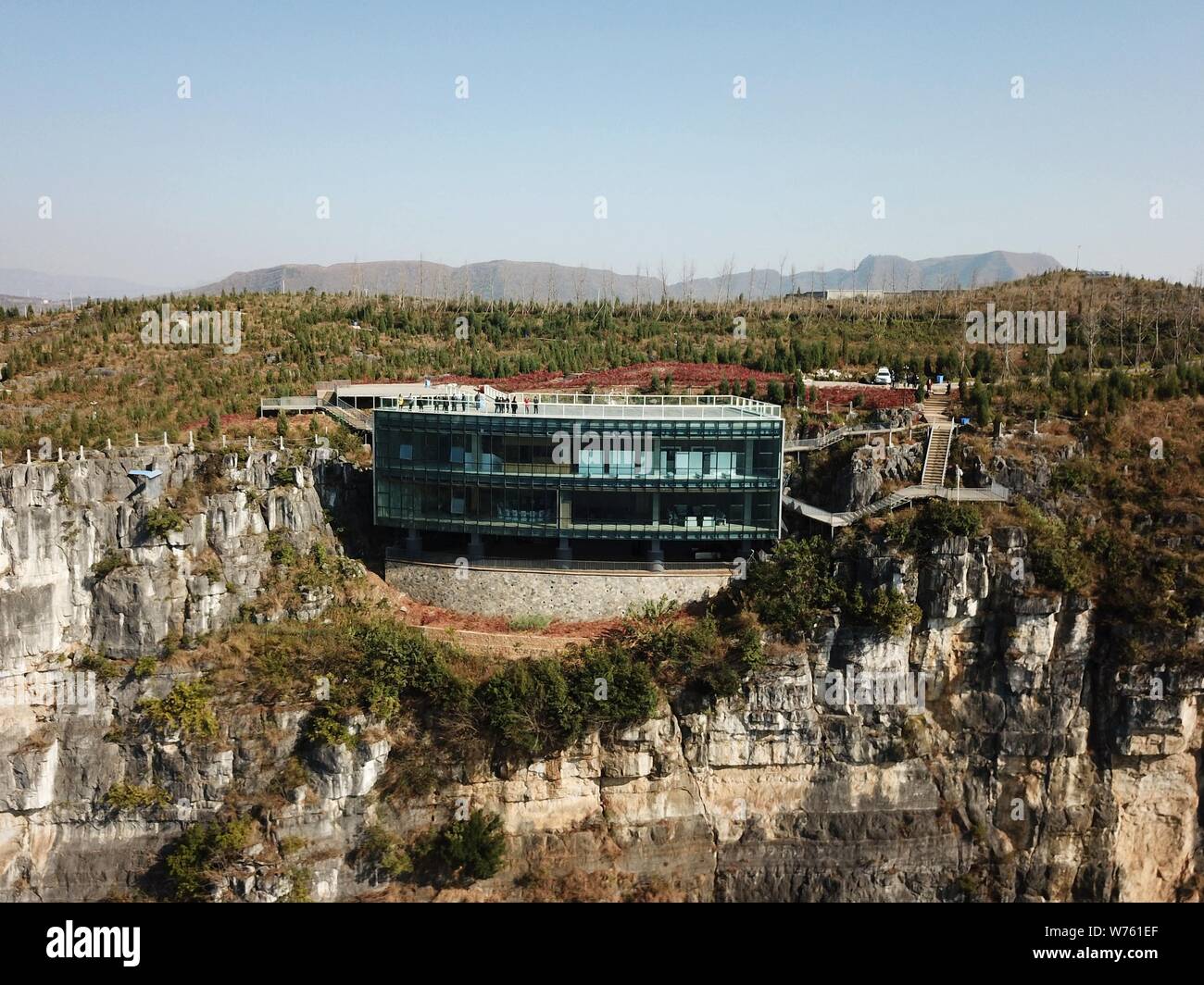 Aerial view of an art museum built on cliff in Anlong county, Qianxinan ...