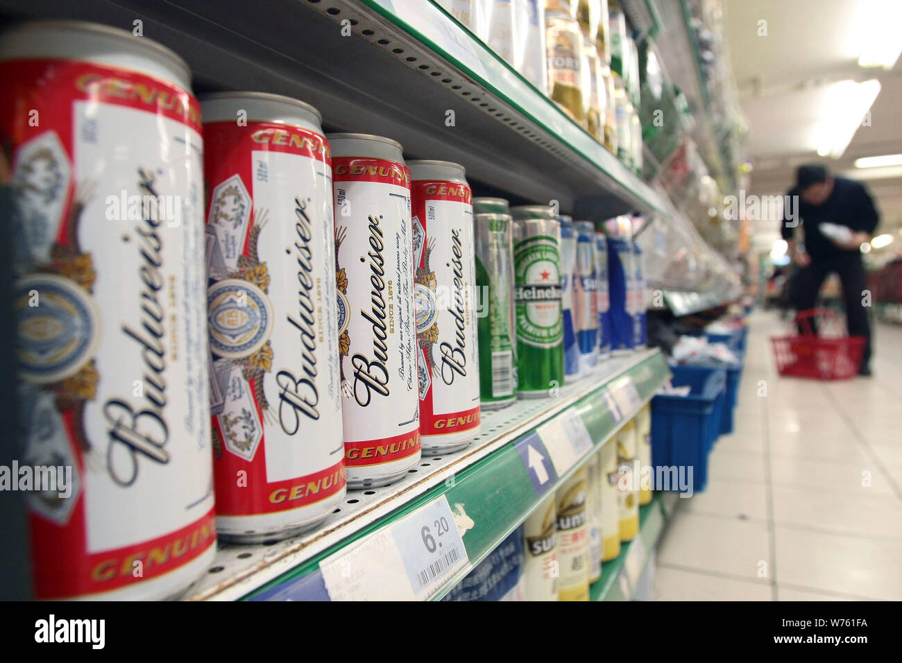 --FILE--Cans of Budweiser beer of Anheuser-Busch InBev Group are for ...