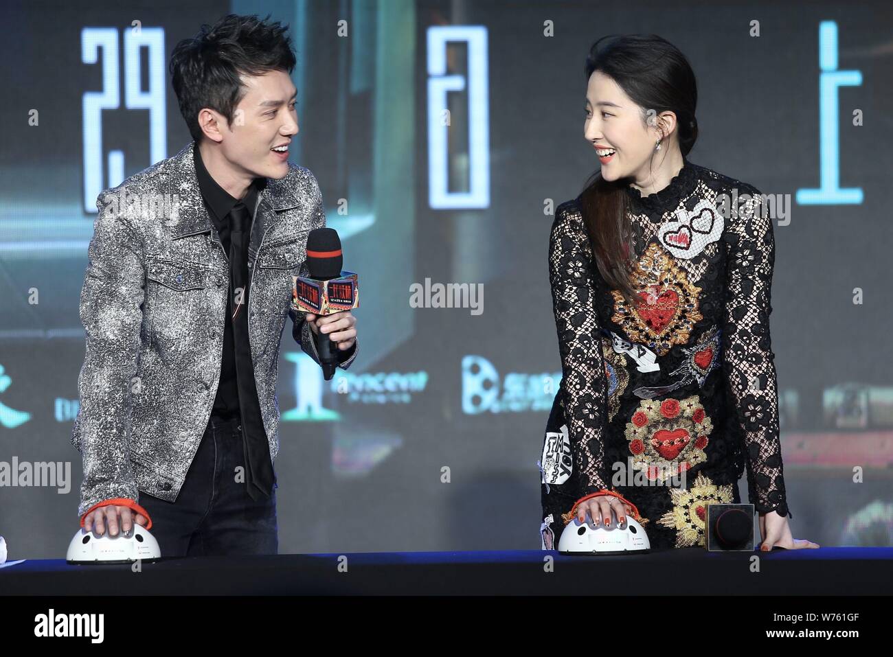 Chinese actress Liu Yifei, right, and Chinese actor Feng Shaofeng ...