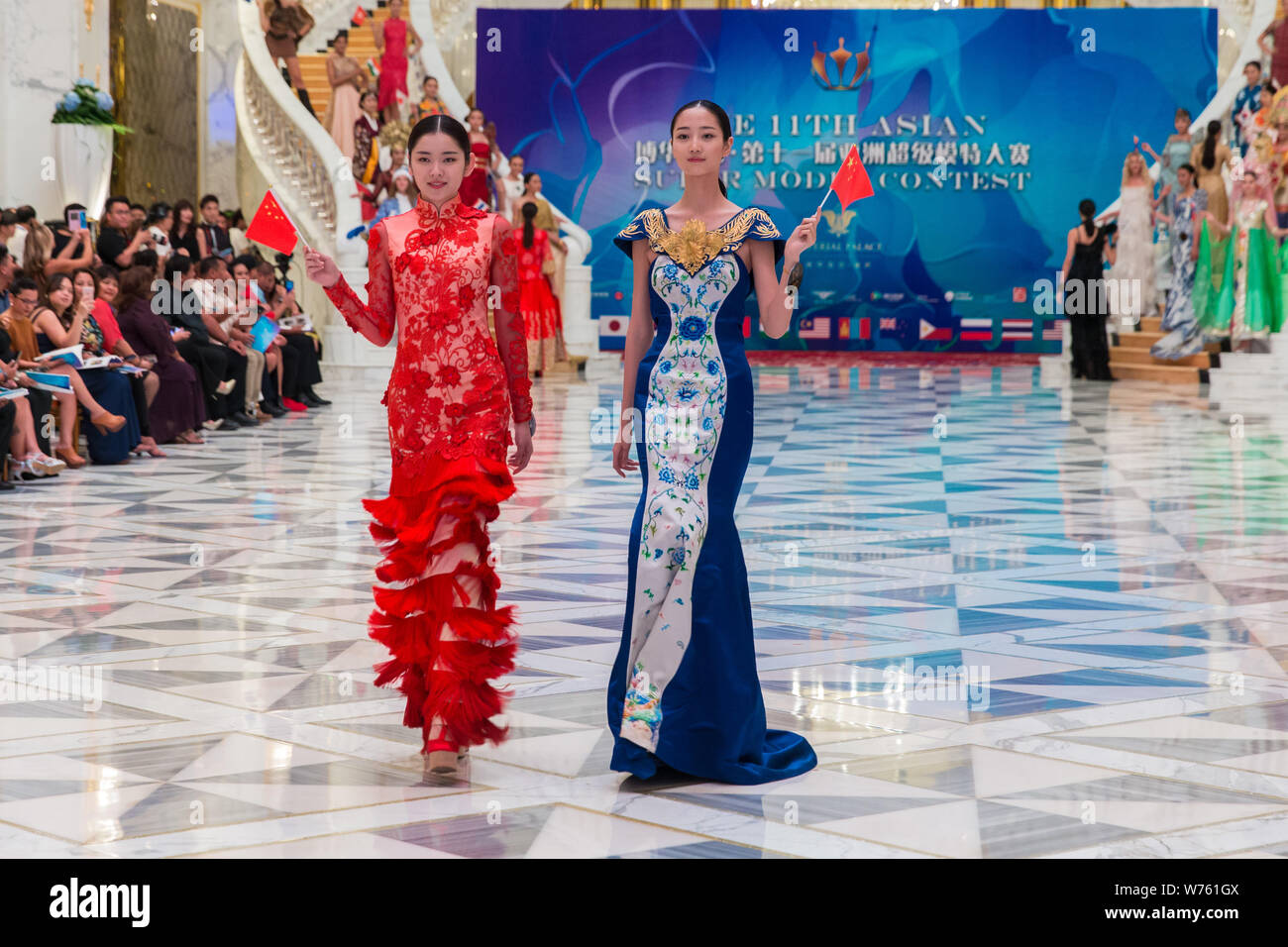 Contestants display creations during the 11th Asian Supermodel Contest ...