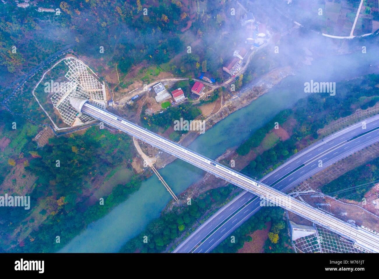 A CHR (China High-speed Railway) bullet train runs on the Xicheng (Xi ...