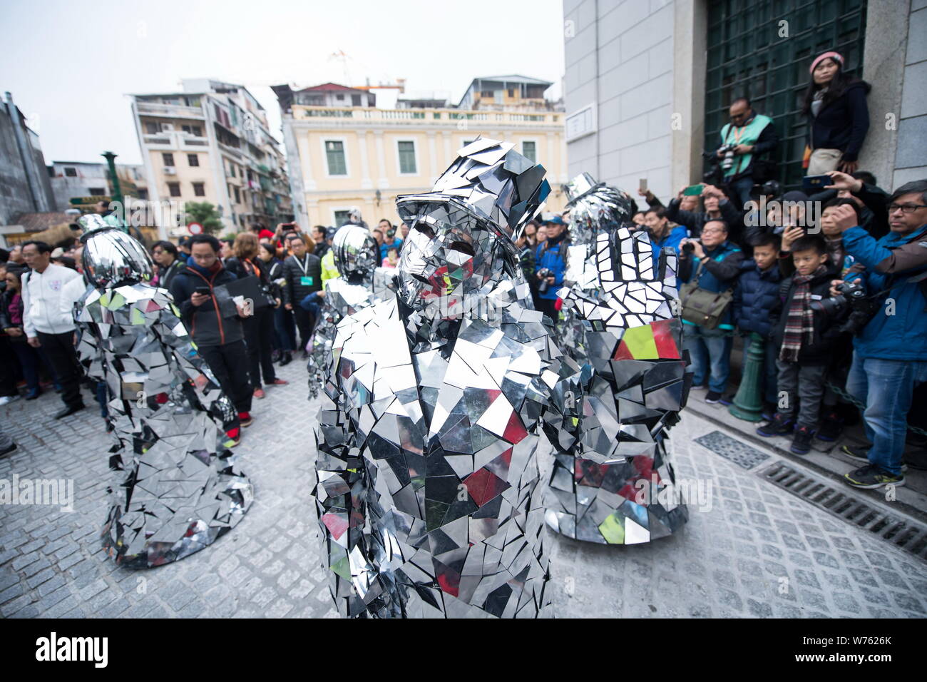 Performers take part in the Macao International Parade to mark the 18th ...