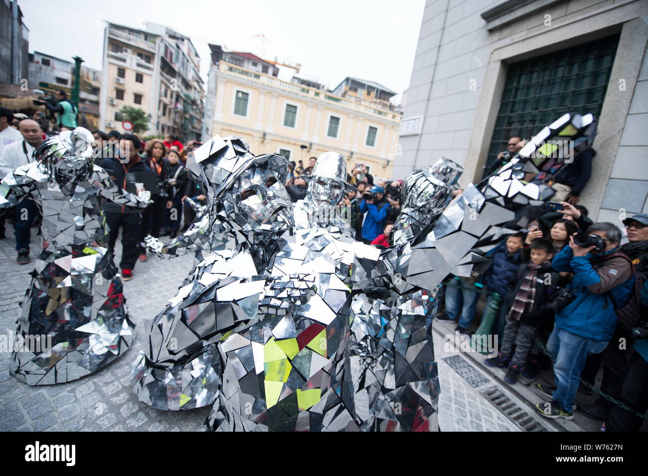 Performers take part in the Macao International Parade to mark the 18th ...