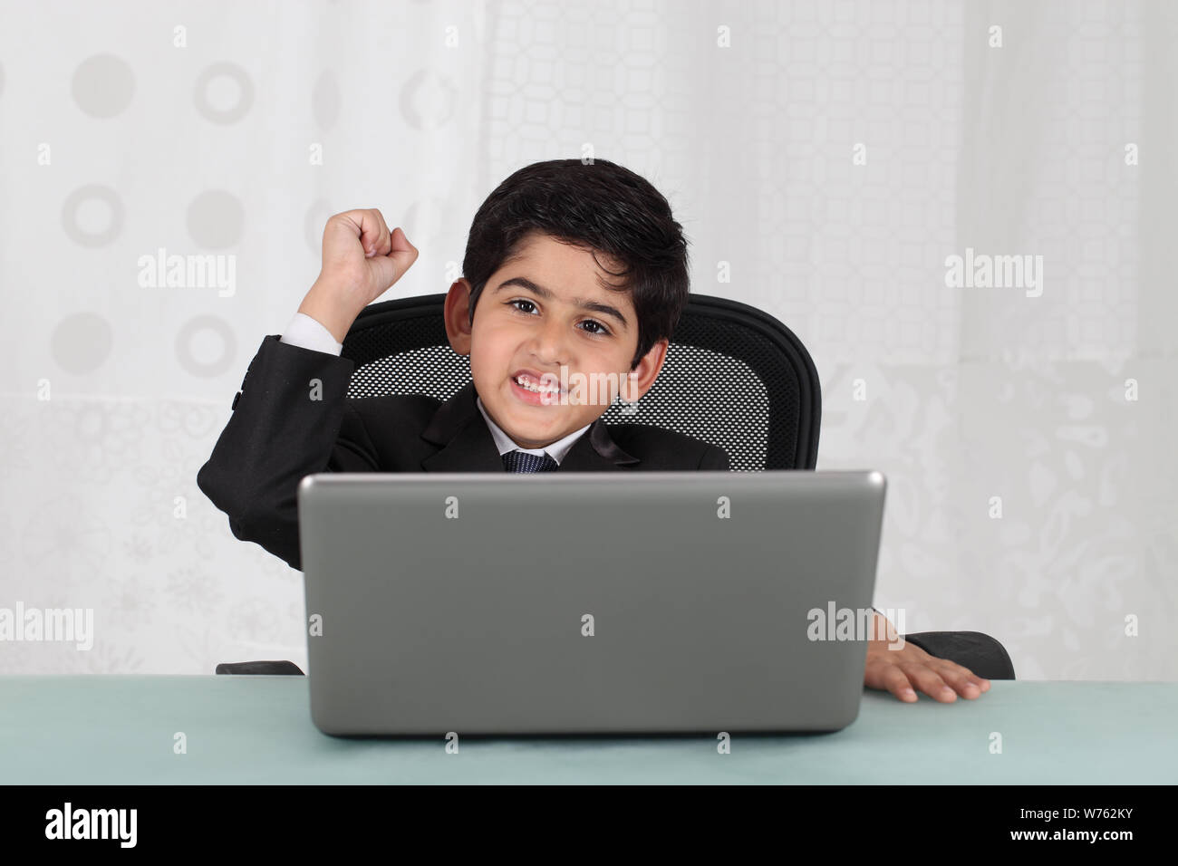Indian boy working hi-res stock photography and images - Alamy