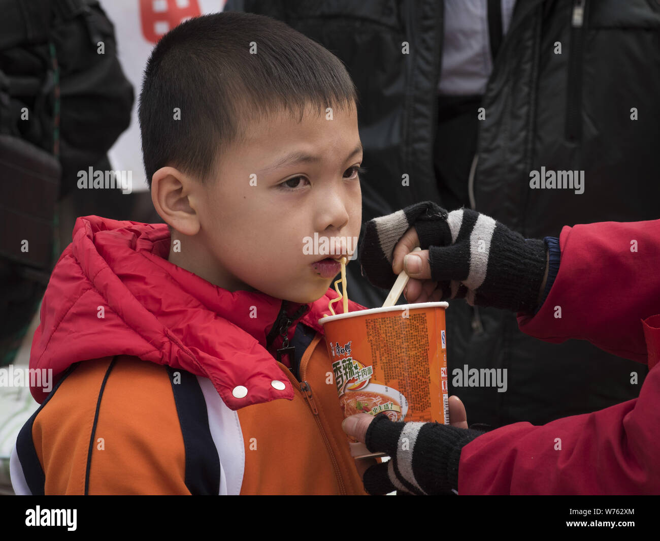 China boy noodles hi-res stock photography and images - Alamy