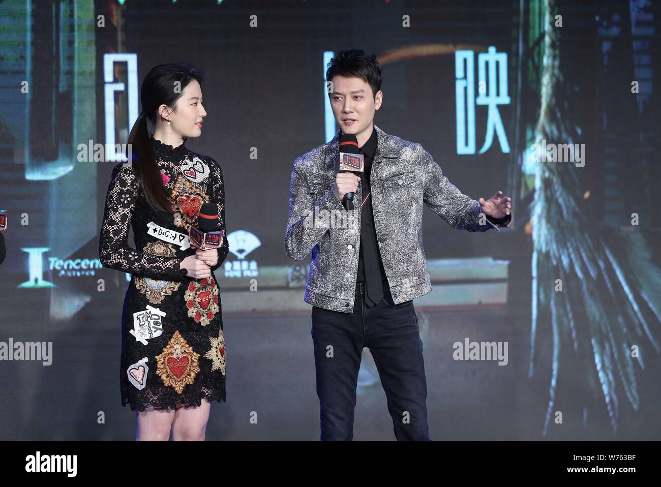 Chinese actress Liu Yifei, left, and Chinese actor Feng Shaofeng attend ...