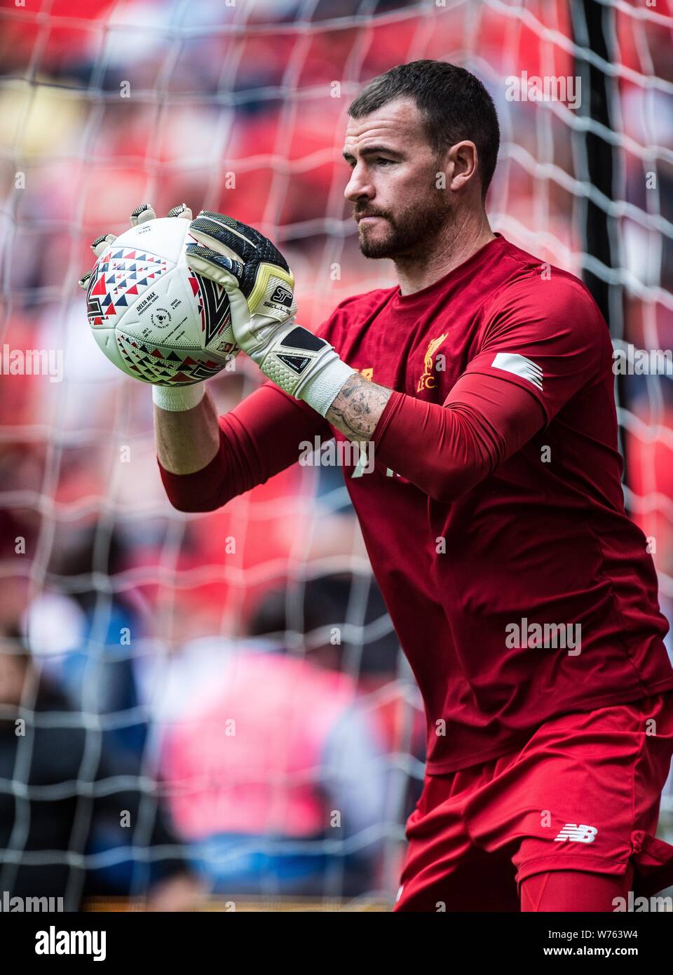 LONDON, ENGLAND - AUGUST 04: Andy Lonergan of Liverpool warm up ahead ...