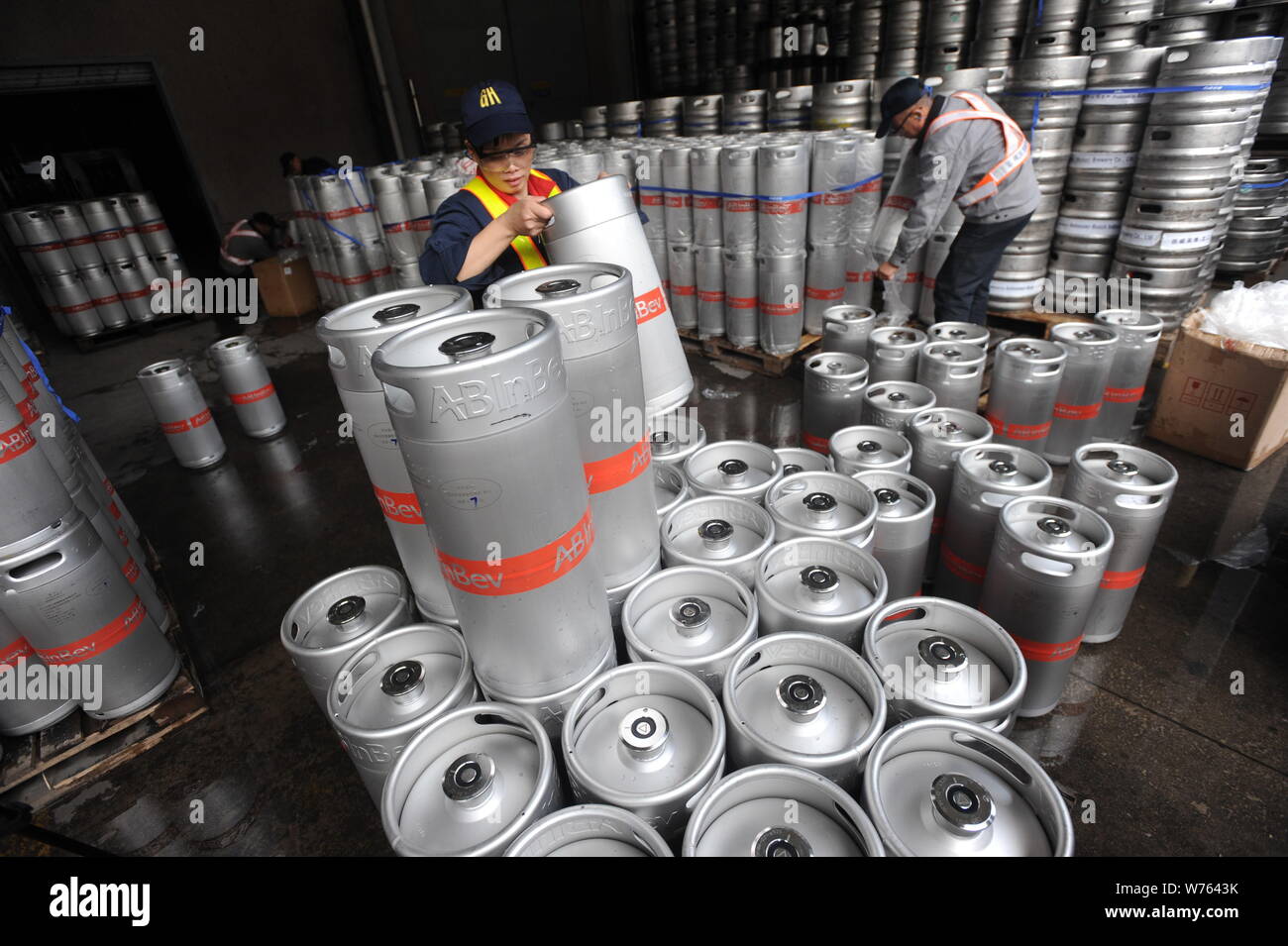 --FILE--Chinese workers produce Budweiser beer at a factory plant of ...