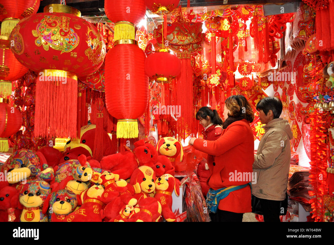 Local Chinese residents shop for red lanterns, decals and other ...