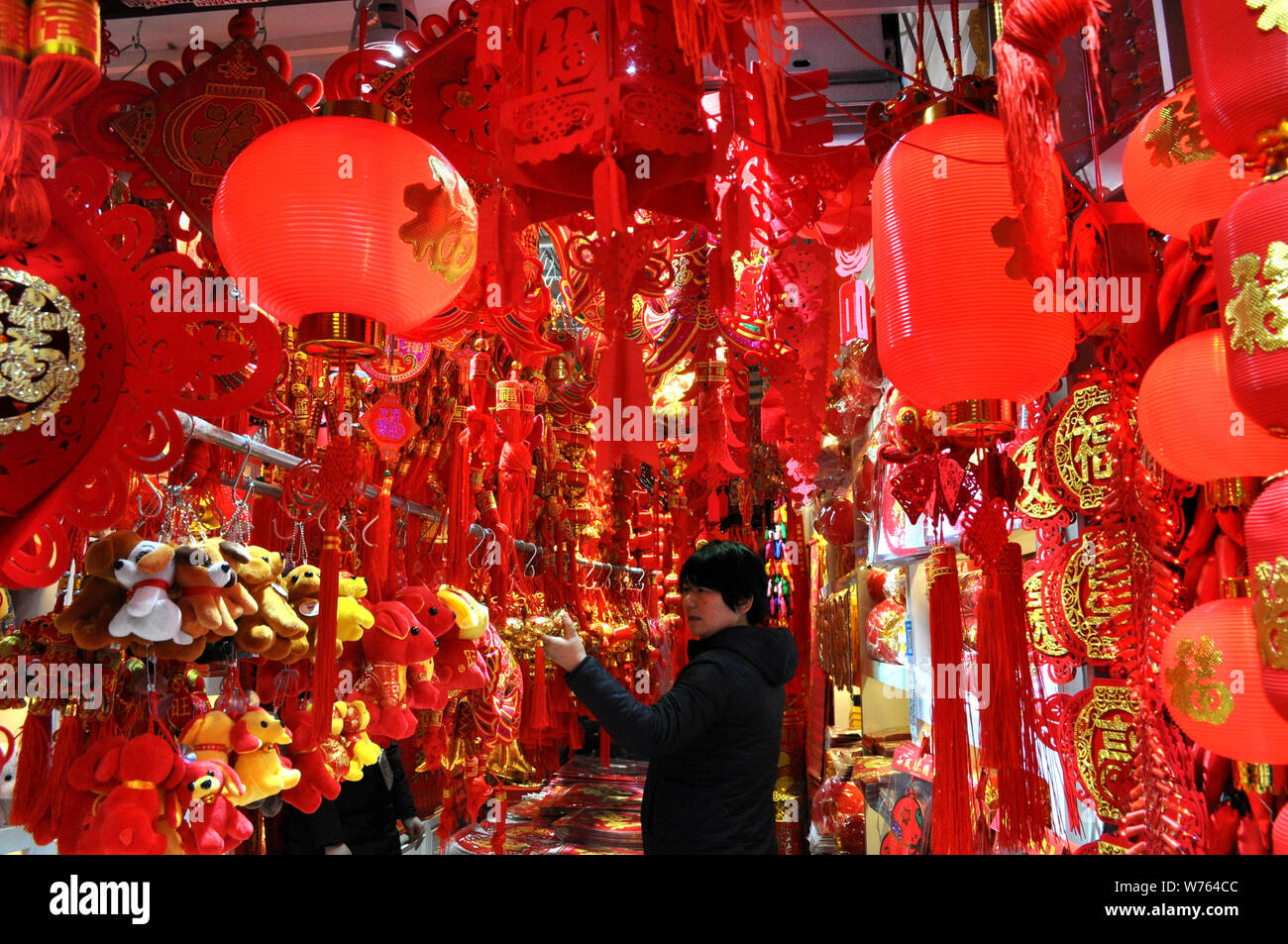 Local Chinese residents shop for red lanterns, decals and other ...