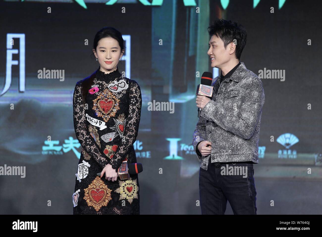 Chinese actress Liu Yifei, left, and Chinese actor Feng Shaofeng attend ...