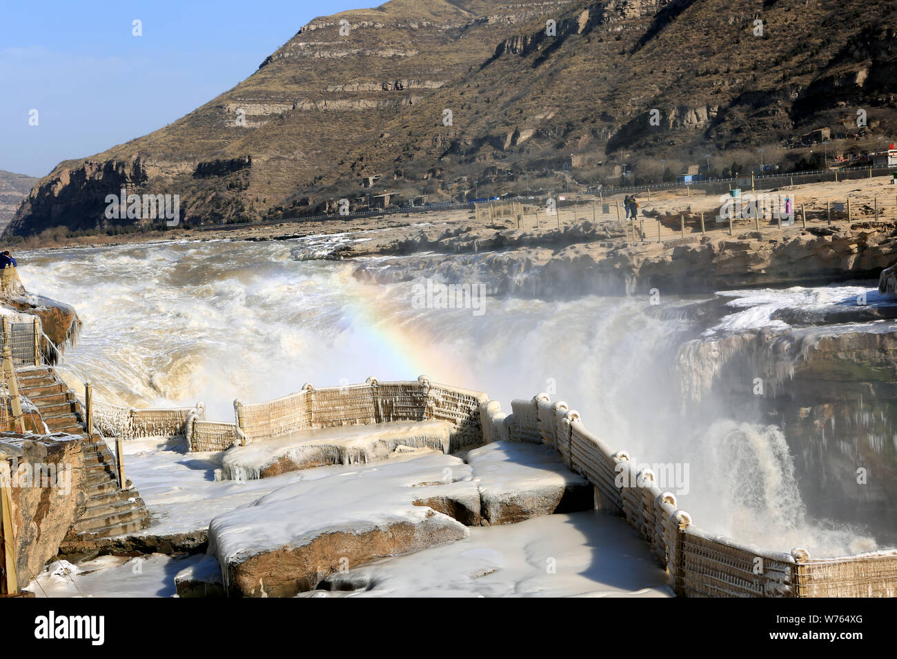 View of the frozen Hukou Waterfall on the Yellow River with glorious ...