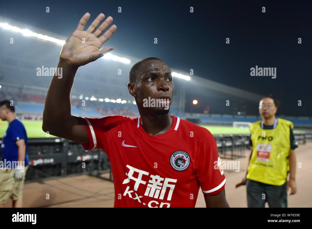 --FILE--Nigerian football player Anthony Ujah of Liaoning Whowin, waves ...