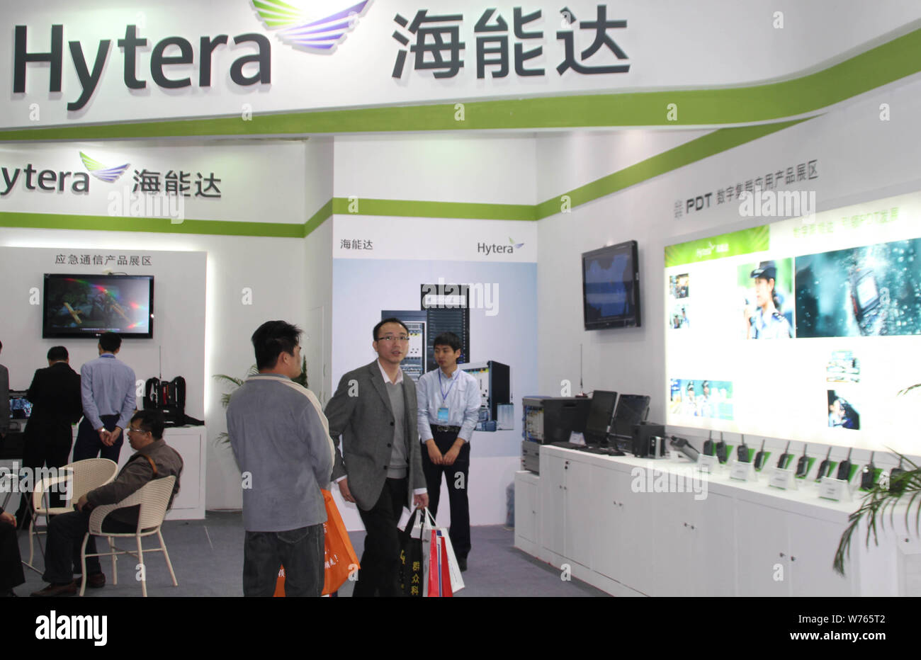 --FILE--People visit the stand of Chinese radio transceivers and radio ...