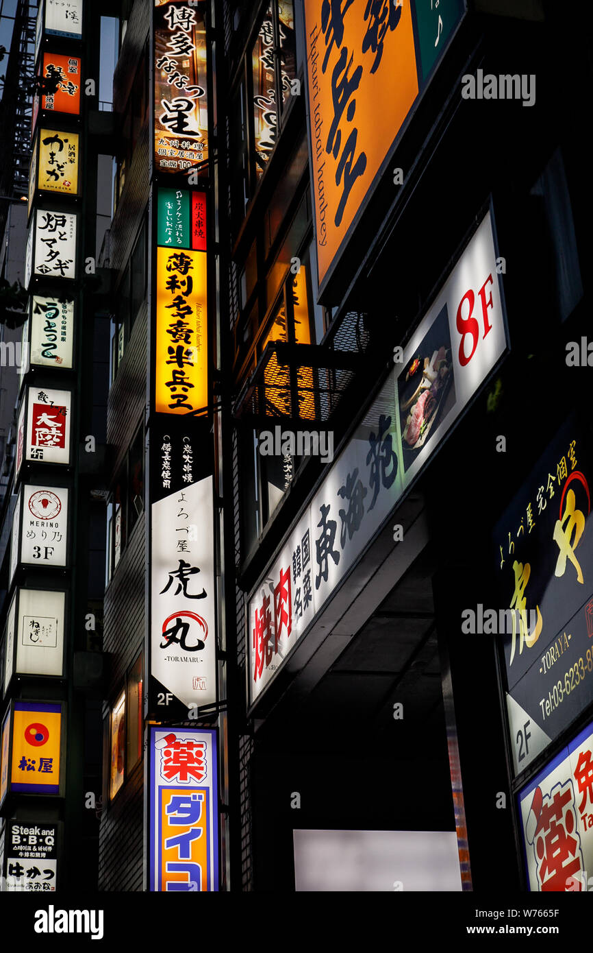 Tokyo, Japan. 4th Aug, 2019. A view of signboards at the Kabukicho in ...