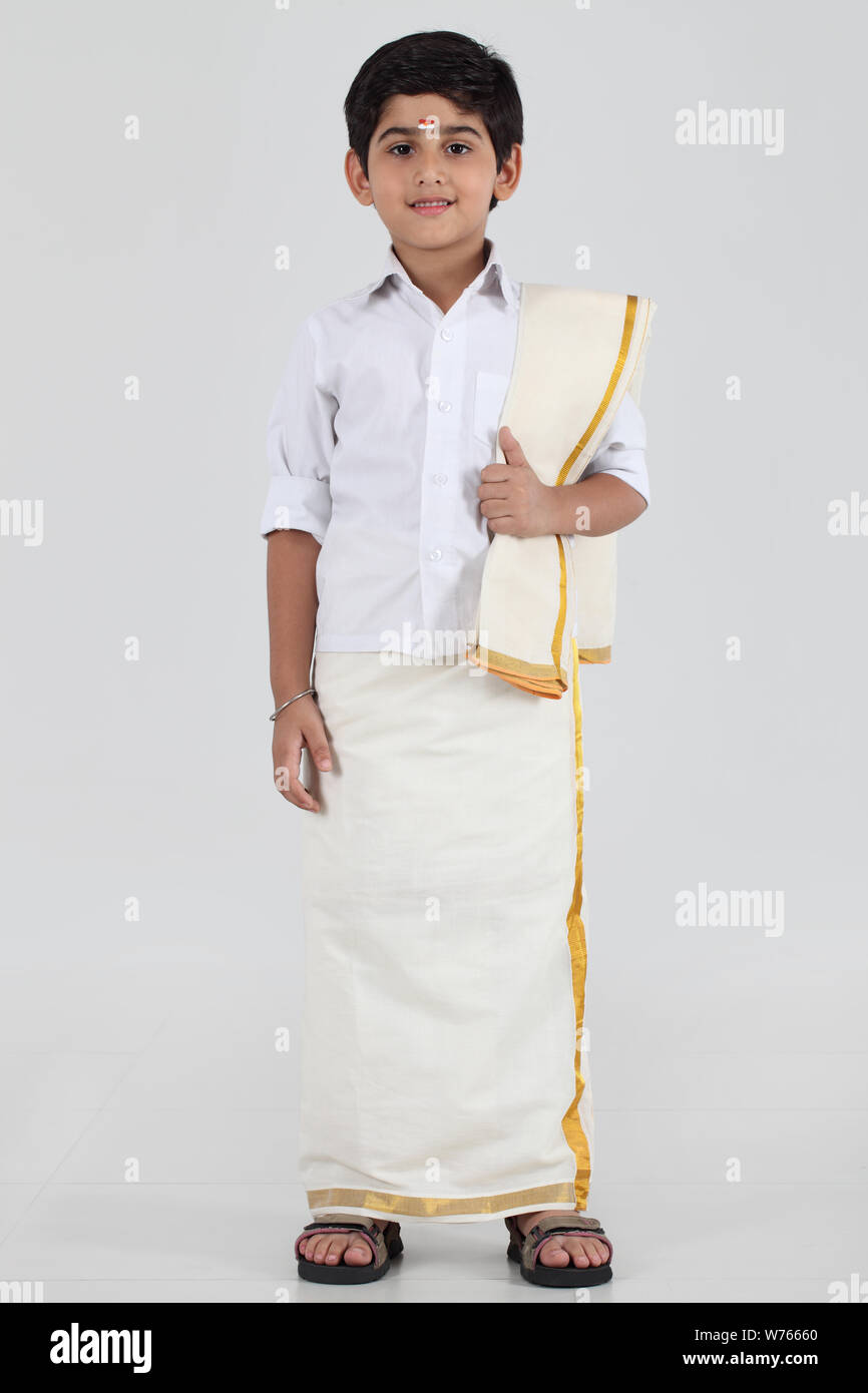 South Indian boy standing Stock Photo - Alamy