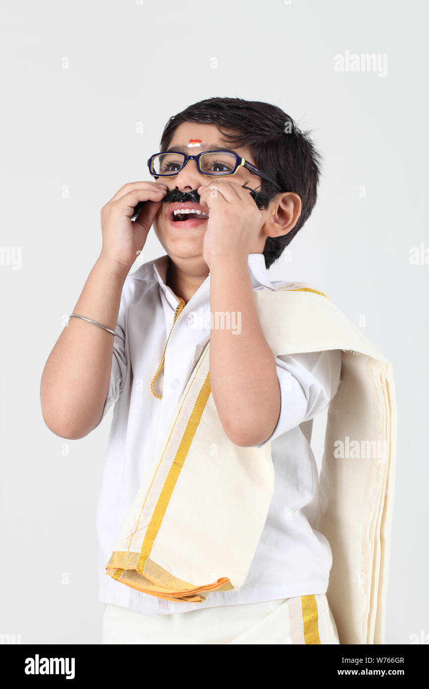 Indian boy pretending to be a south Indian showing mustache Stock Photo ...