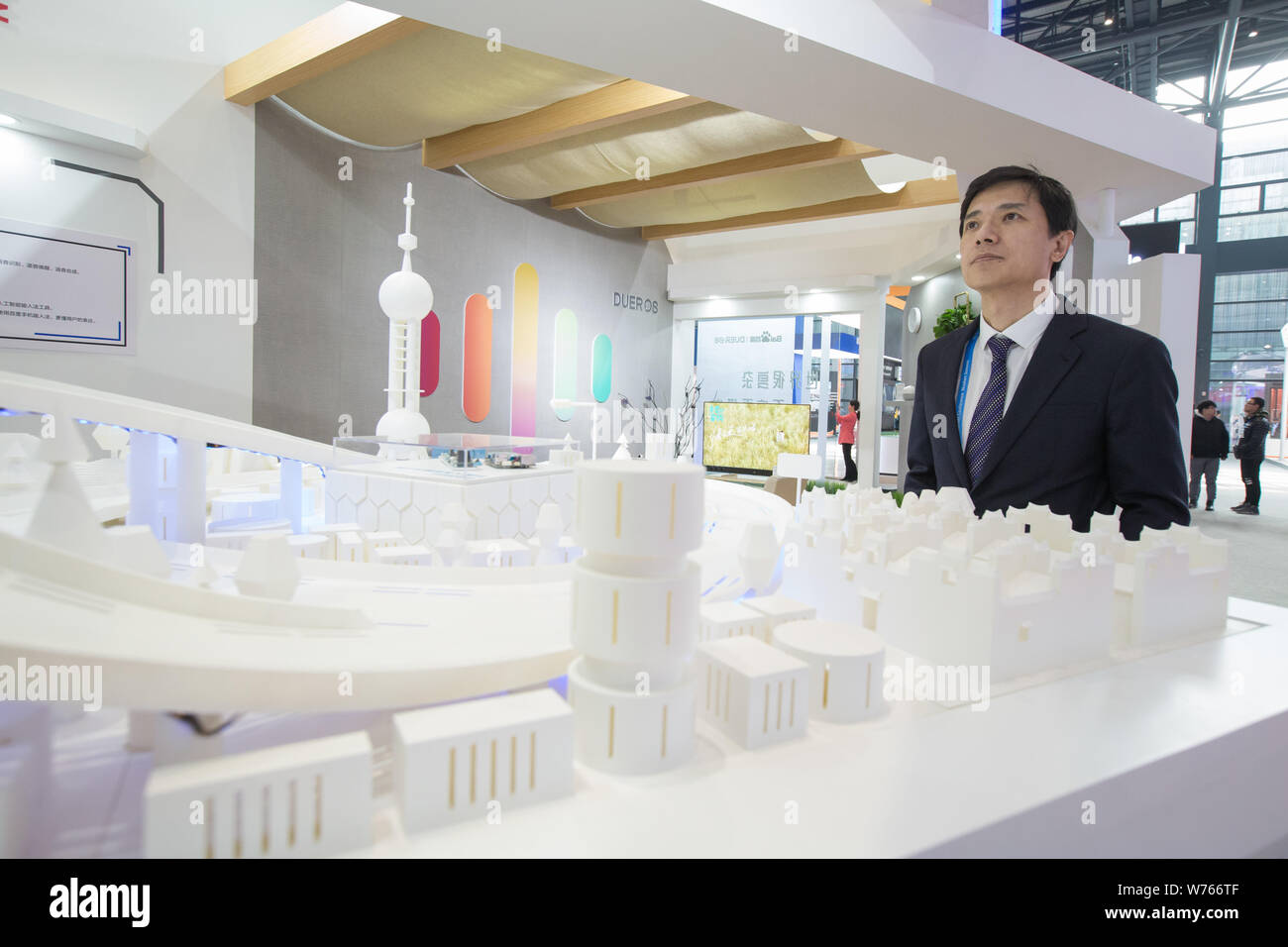 Robin Li Yanhong, Chairman and CEO of Baidu Inc., poses for photos at ...