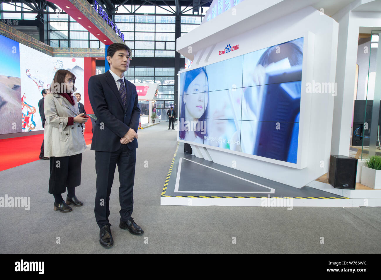Robin Li Yanhong, Chairman and CEO of Baidu Inc., poses for photos at ...