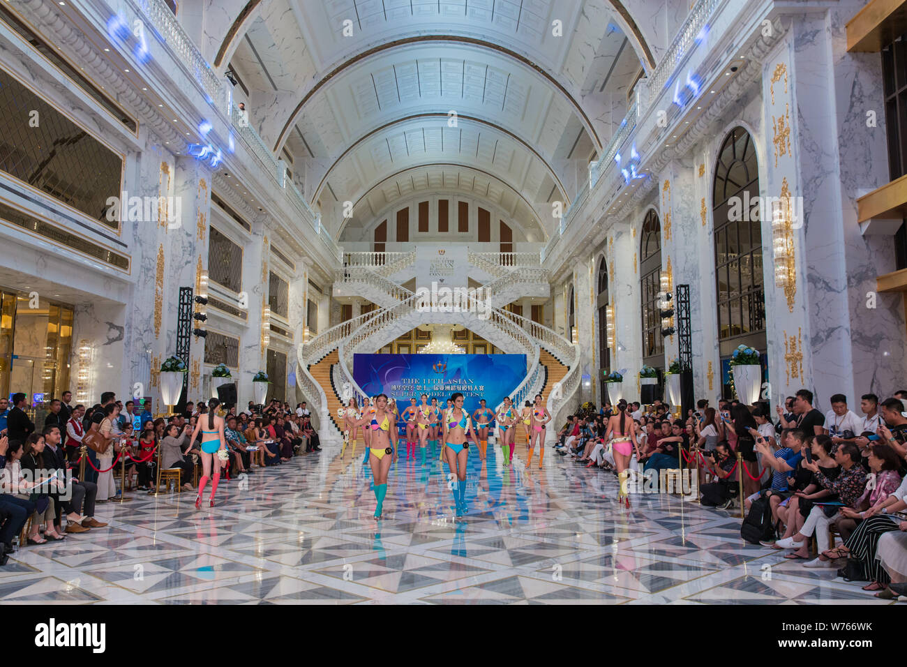 Contestants display creations during the 11th Asian Supermodel Contest ...