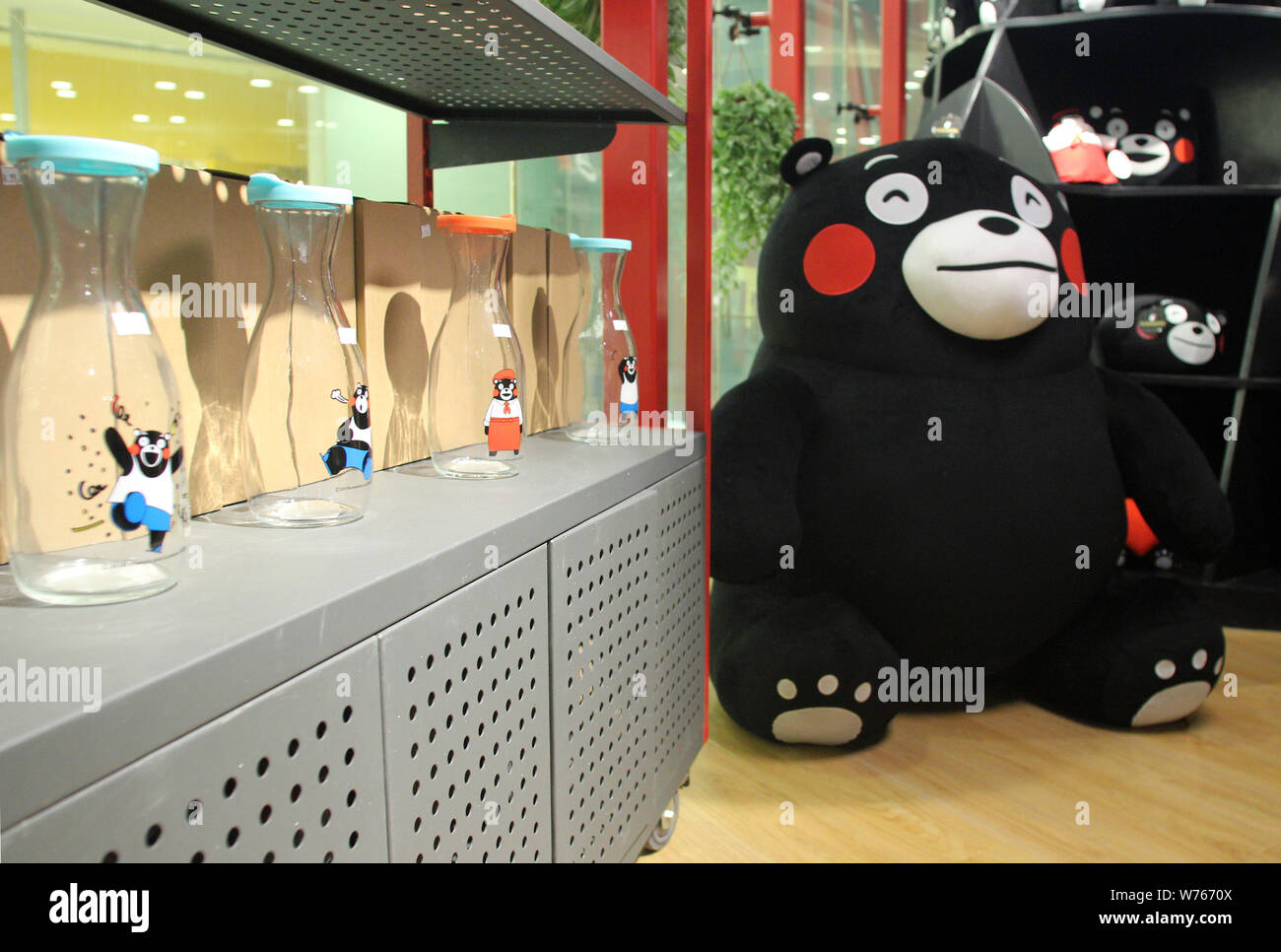 The Kumamon toys are on display at the Beijing's largest Kuma Cafe at ...