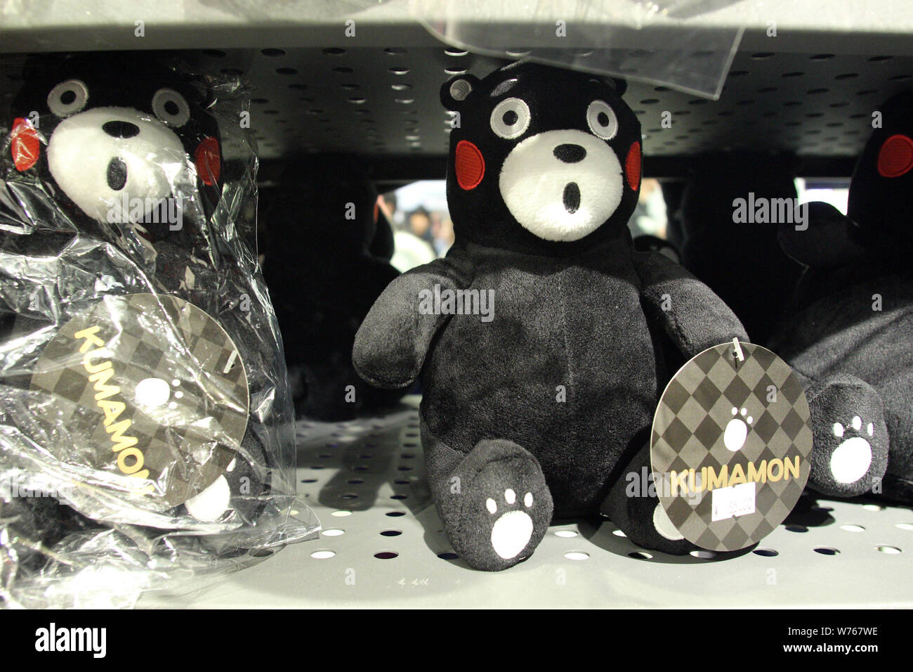 The Kumamon toys are on display at the Beijing's largest Kuma Cafe at ...