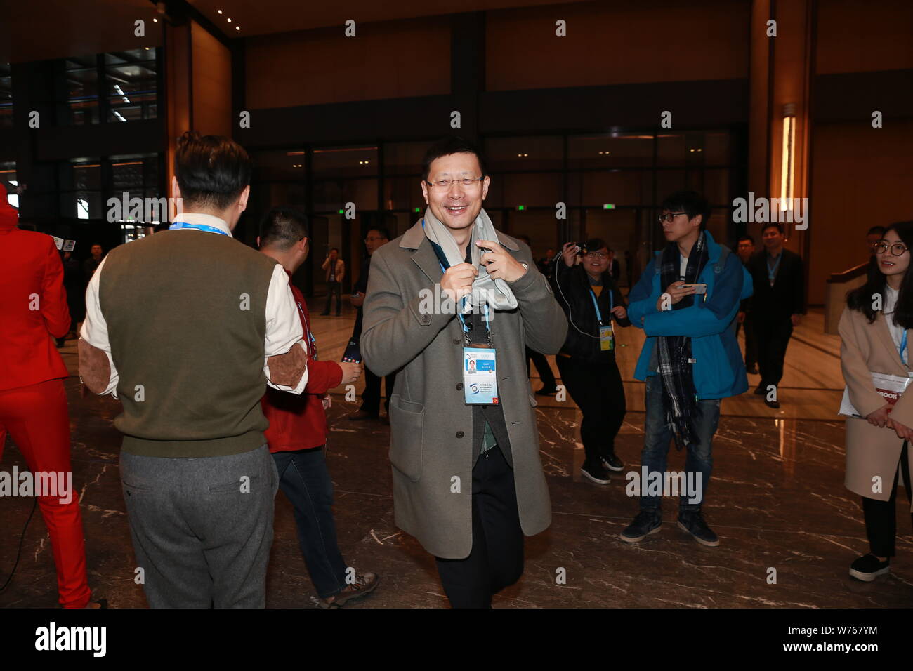 Neil Shen or Shen Nanpeng, center, managing partner of Sequoia Capital ...