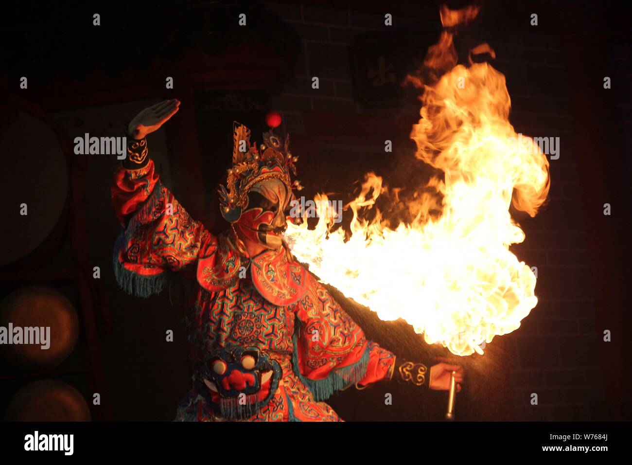 --FILE--A Chinese Sichuanese opera artist performs during a show at a ...