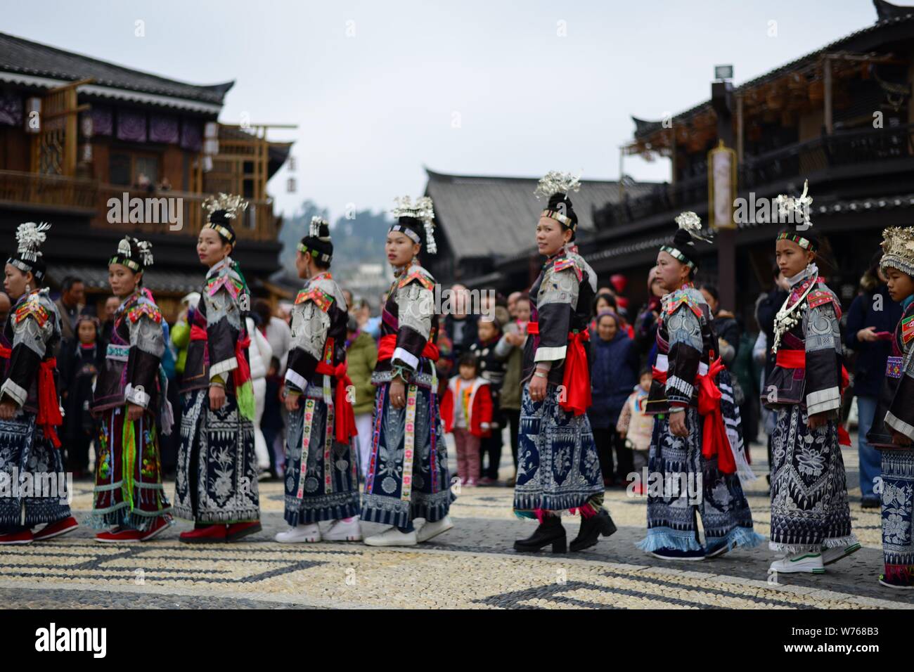 Chinese people of Miao ethnic minority dressed in traditional silver ...